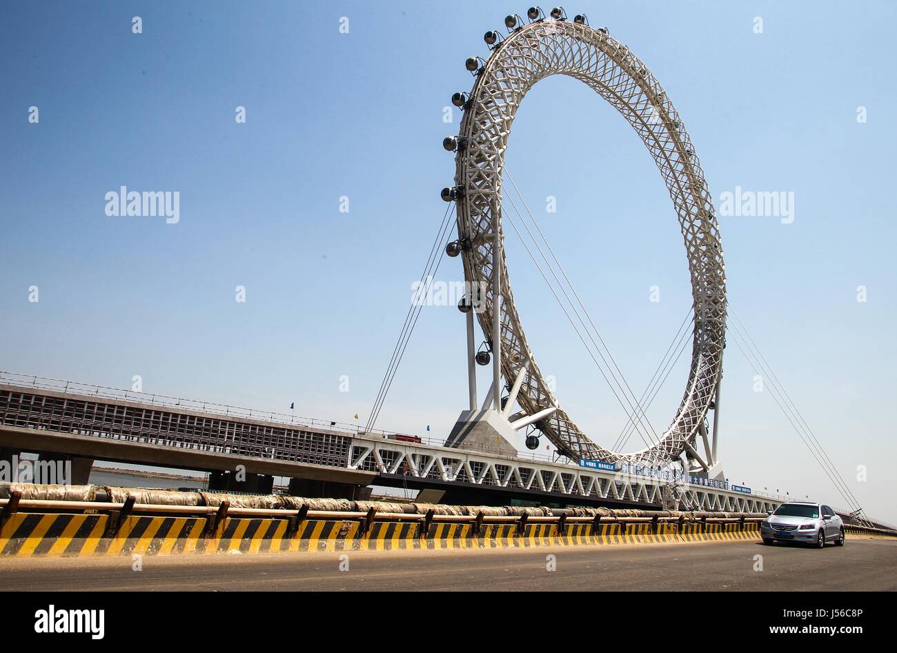 Weifang, China's Shandong Province. 17th May, 2017. A car drives past a ...