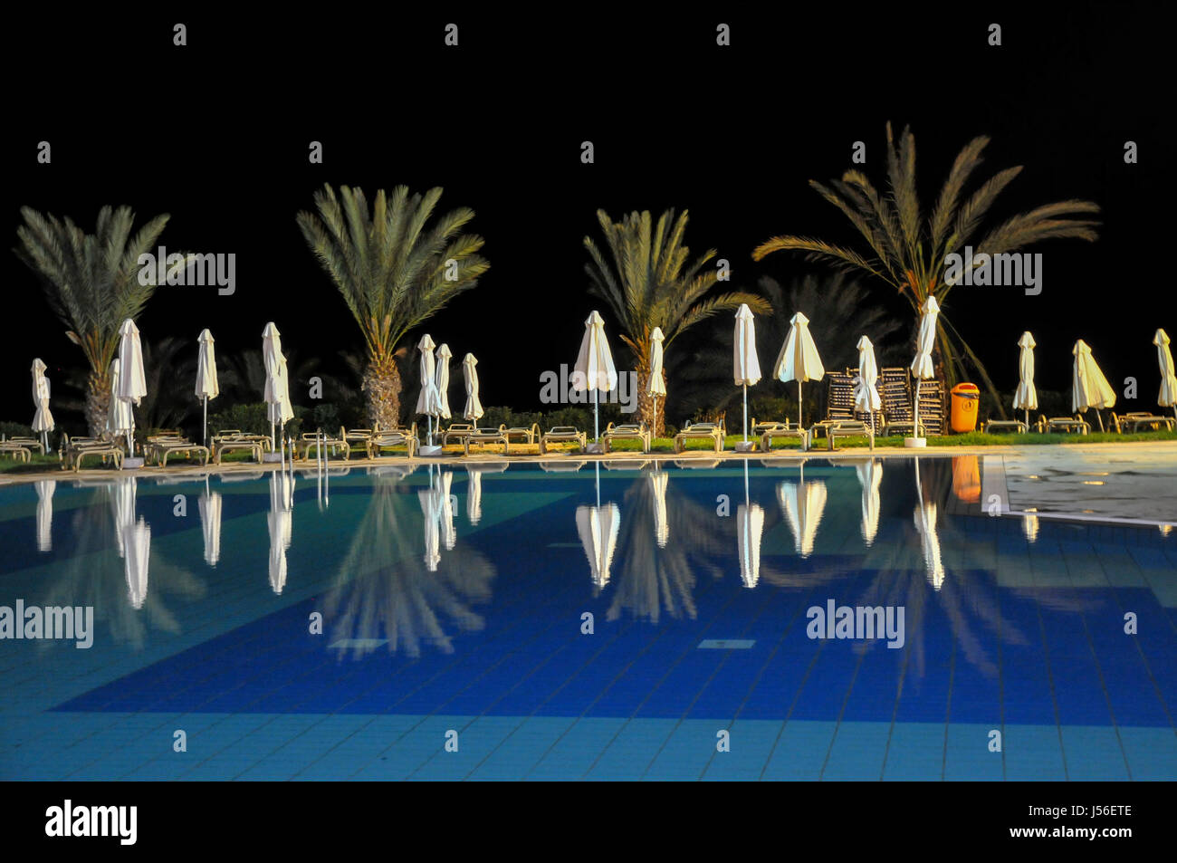 Swimming pool at a resort hotel at night. Paphos, Cyprus Stock Photo ...