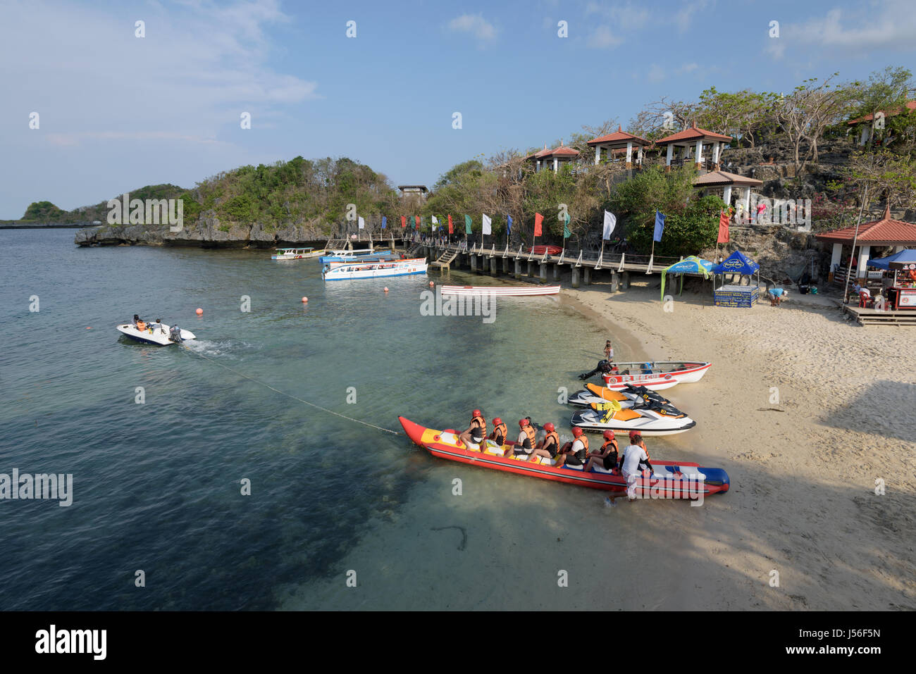 Quezon Island, Philippines - April 11, 2017: Jet Ski pulling a banana ...