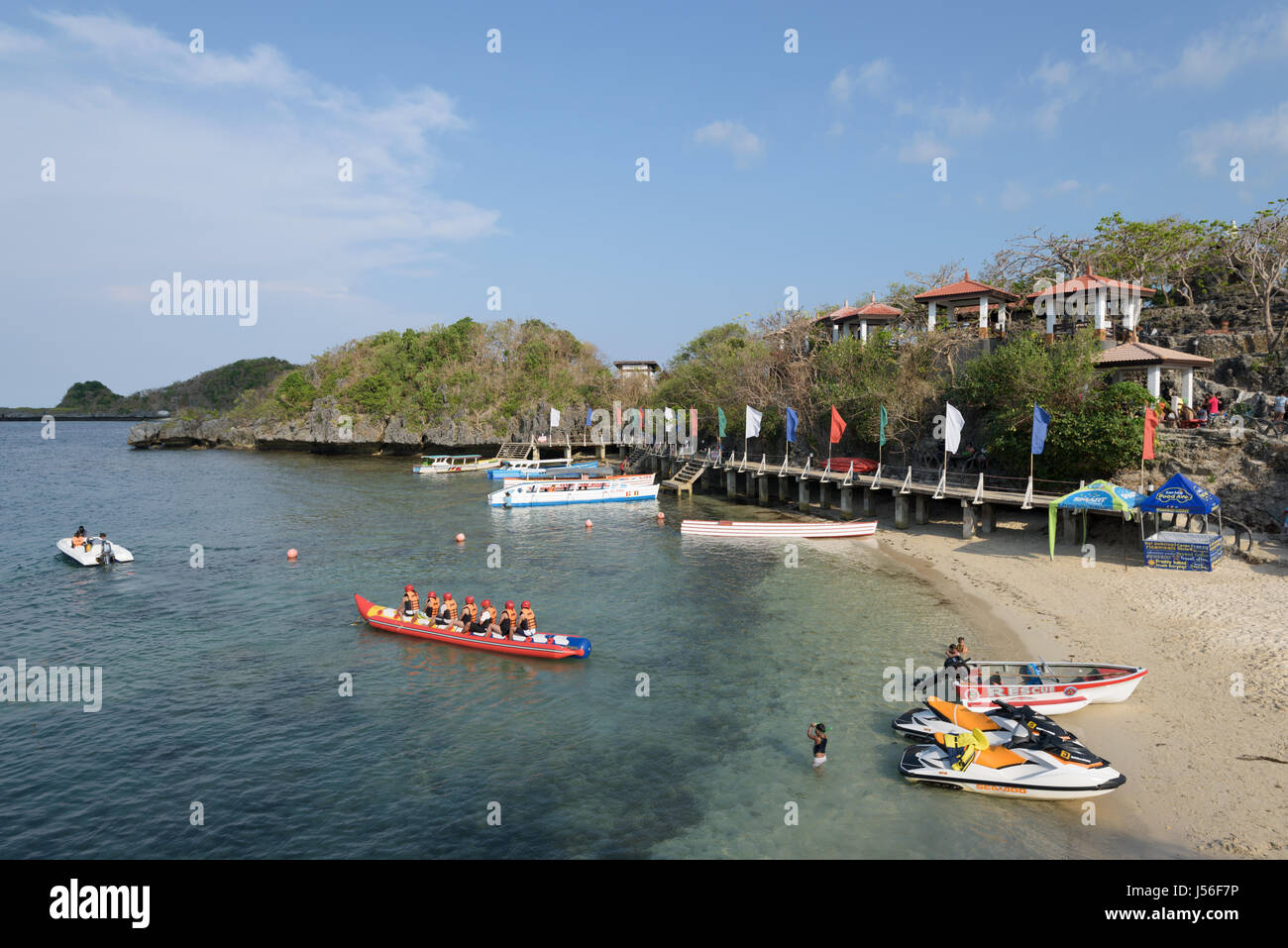 Quezon Island, Philippines - April 11, 2017: Jet Ski pulling a banana ...