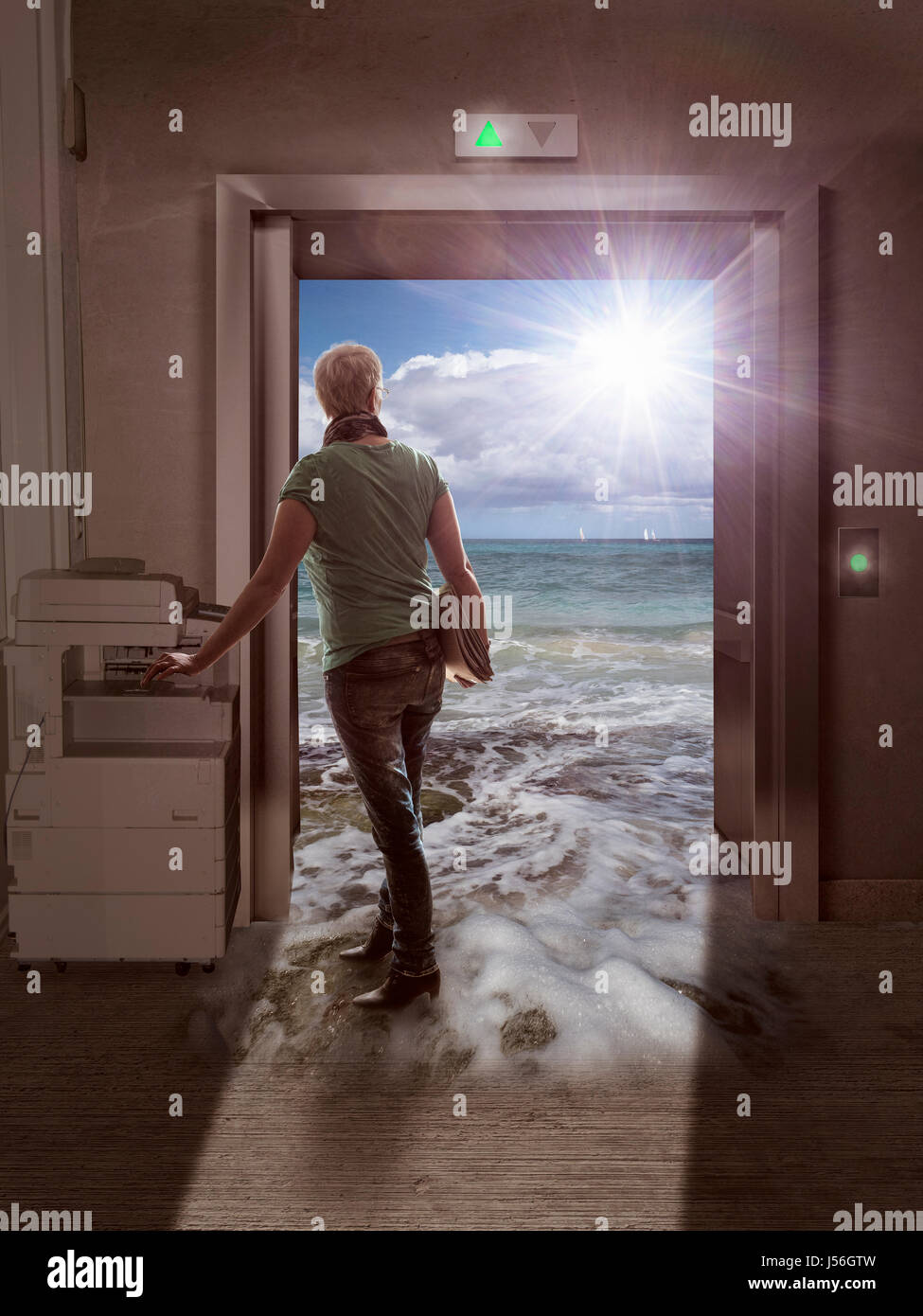 Work woman elevator hi-res stock photography and images - Alamy