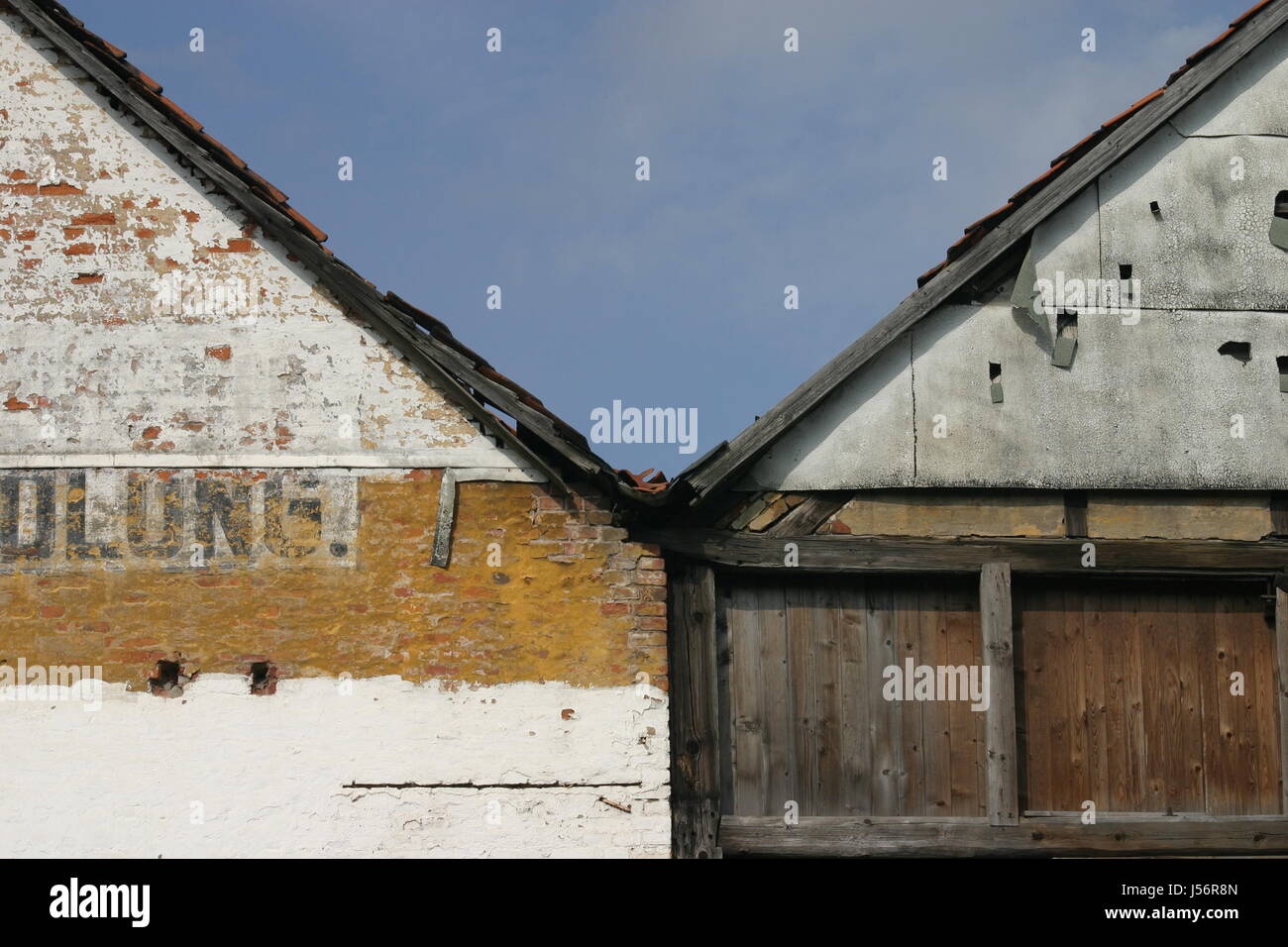 houses ailing roofs storefronts gable rotten firmament sky unclouded ...