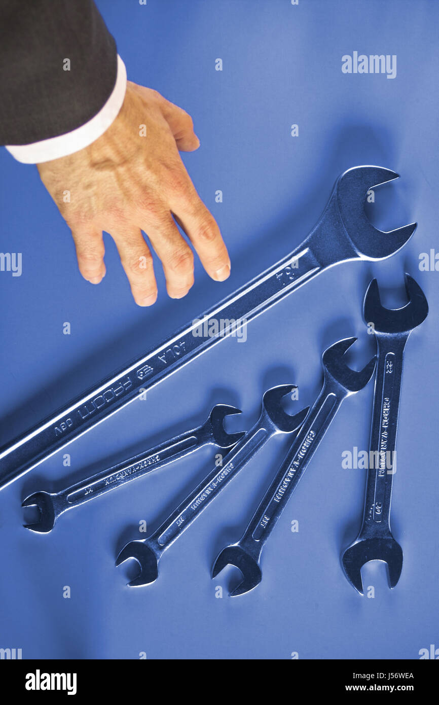 hand on wrench vol1 Stock Photo - Alamy