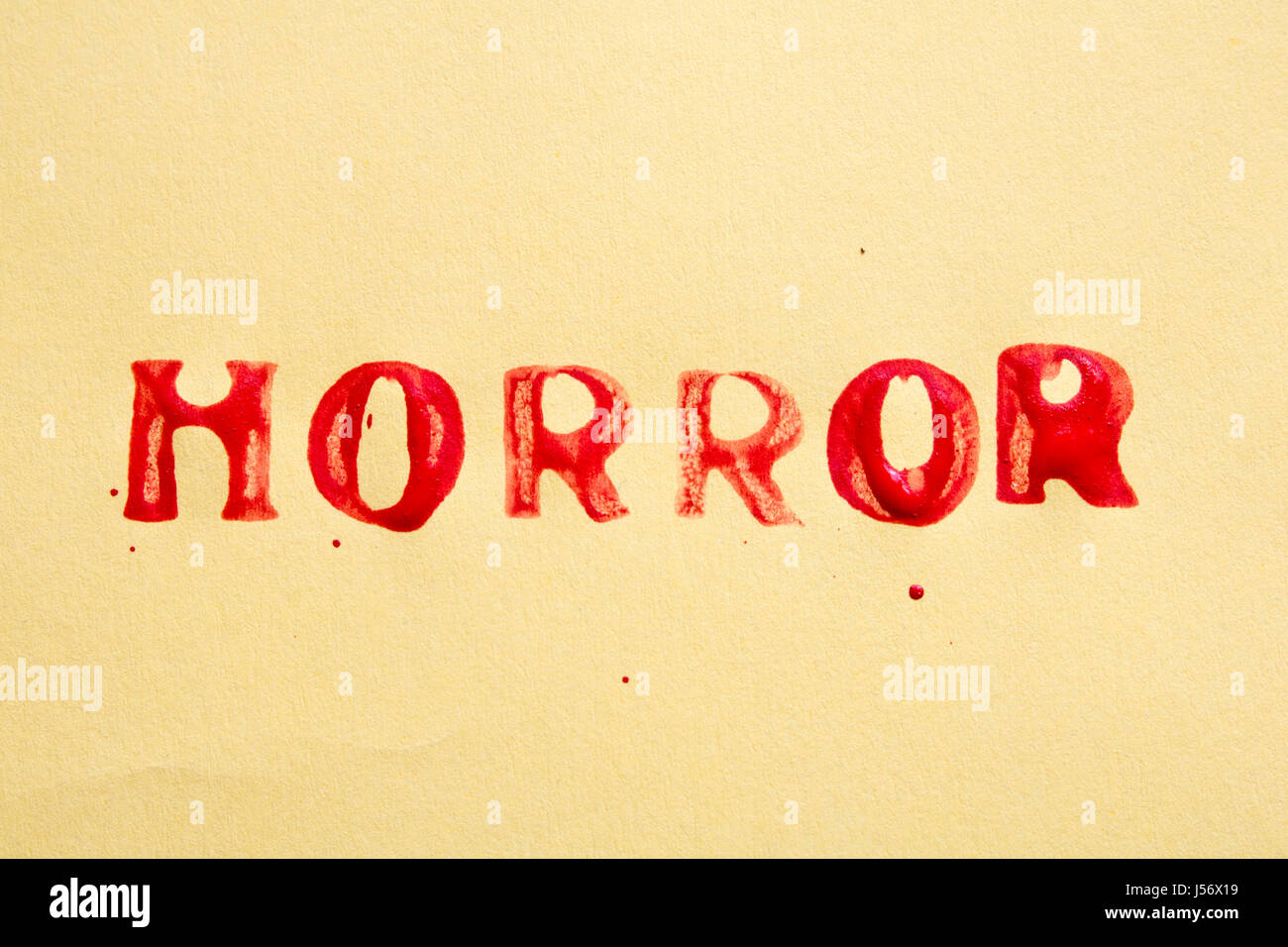 Horror Stamp Print Text in Blood Colored Paint Stock Photo - Alamy