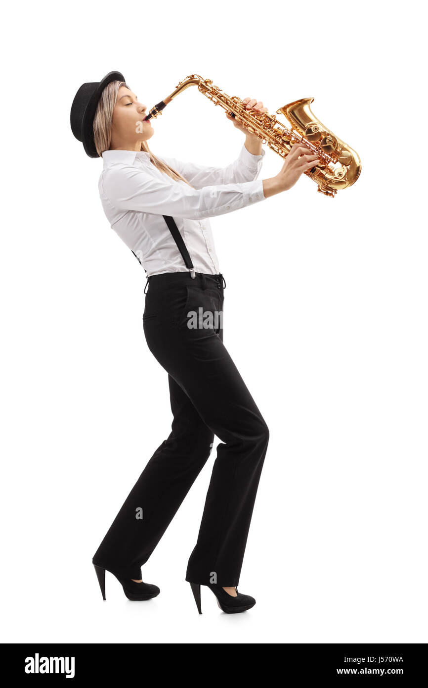 Full length profile shot of a female jazz musician playing a saxophone ...