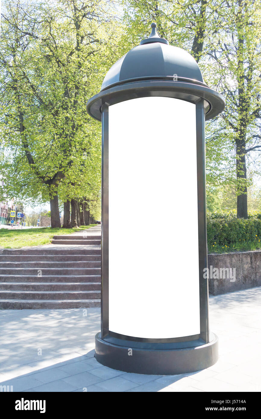 Mock up of retro style street advertising column stand on sidewalk ...