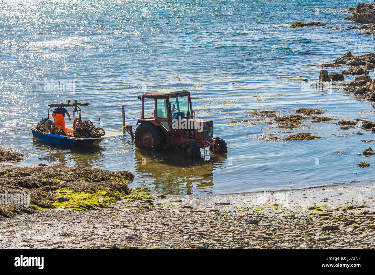 Tractor pulling boat hi-res stock photography and images - Alamy