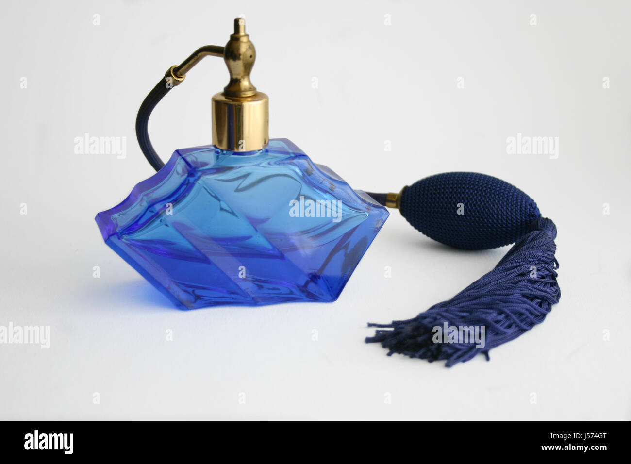 blue perfume bottle Stock Photo - Alamy