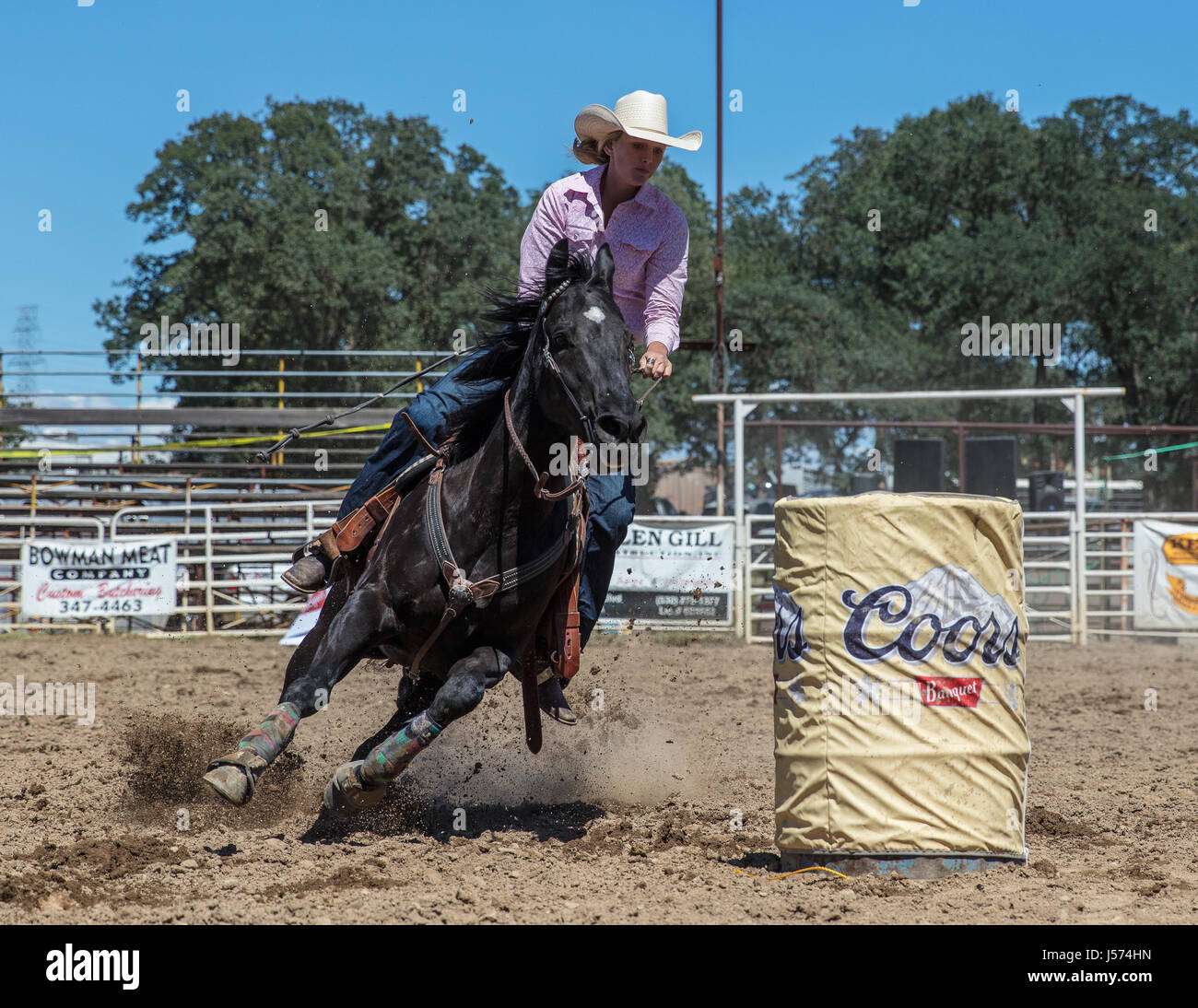 Bull riding cowboys at the rodeo in Cottonwood, California Stock Photo ...