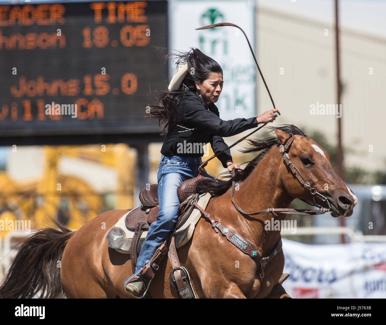 Bull riding cowboys at the rodeo in Cottonwood, California Stock Photo ...
