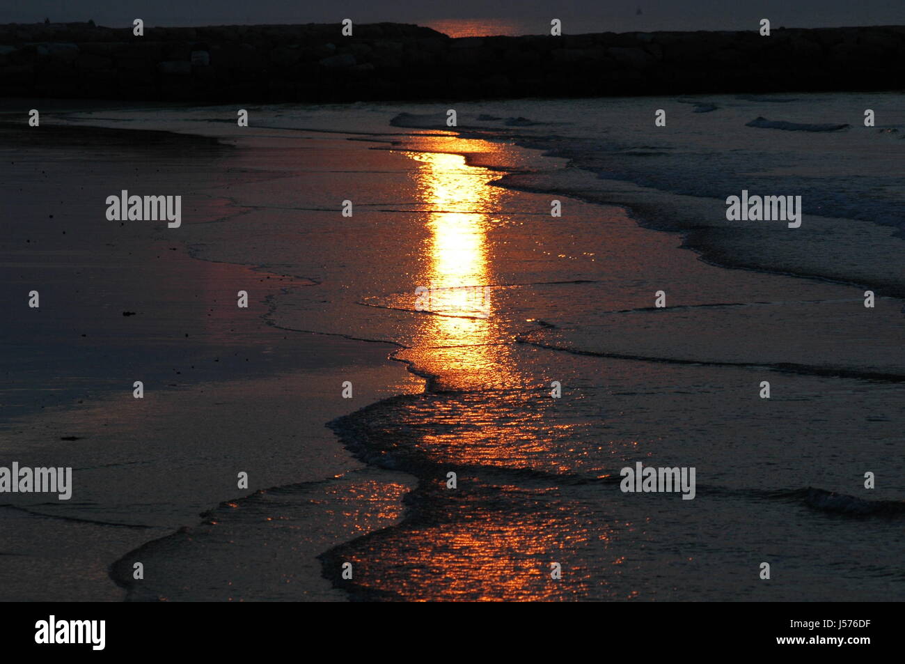 reflection on the beach Stock Photo - Alamy