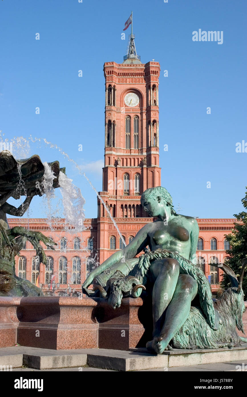 red town hall with statue Stock Photo - Alamy