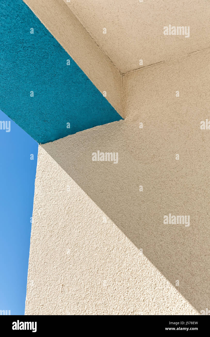 Architectural Corner detail of modern white and blue rendered building ...