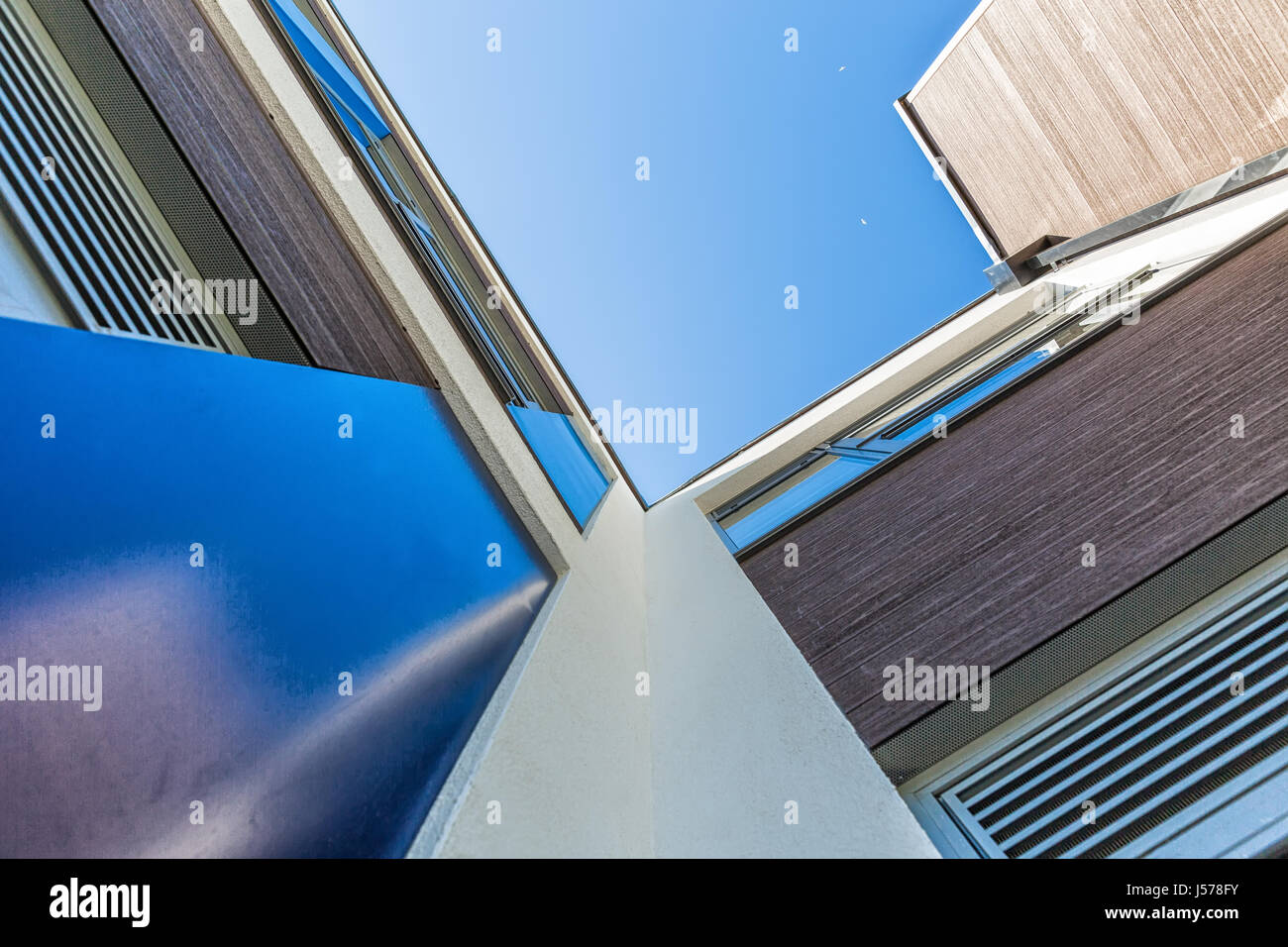 Disappearing glass office buildings in the morning, wide angle view ...