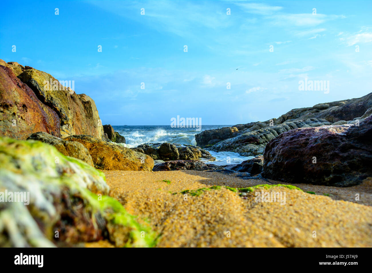 Waves washing over rocks, Indian Ocean Stock Photo - Alamy
