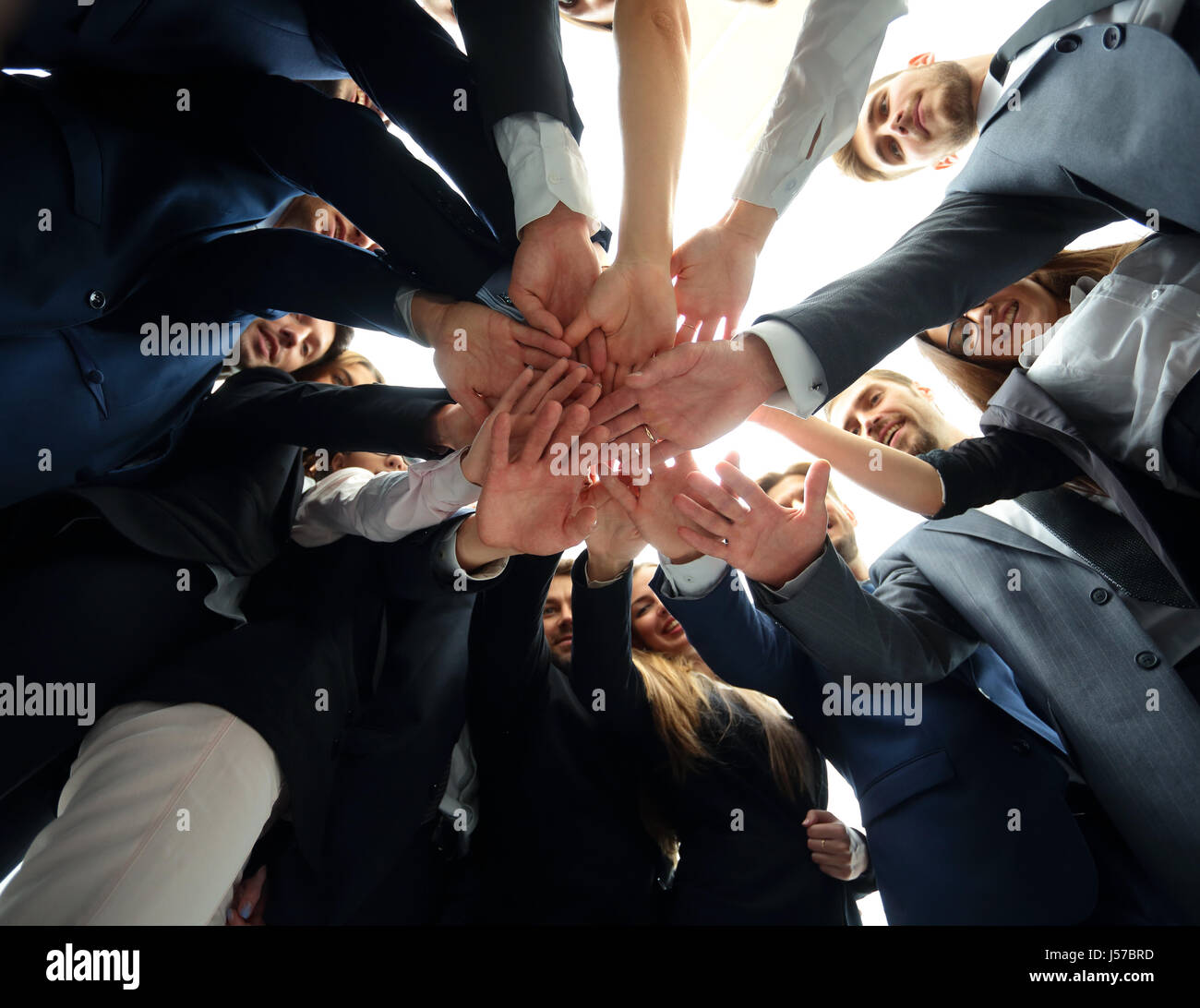 Large successfull business team showing unity with their hands t Stock ...