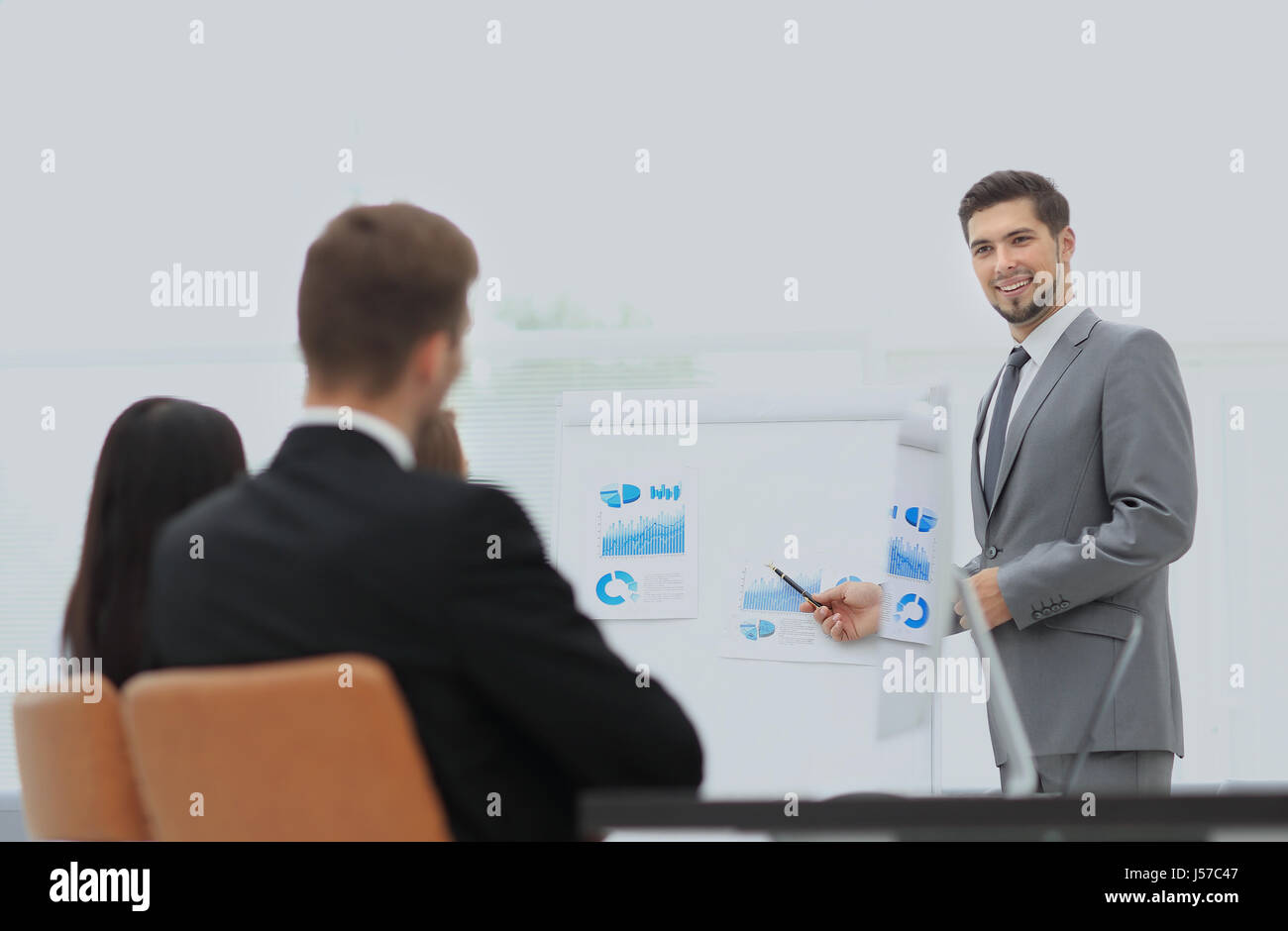 Successful business presentation of a man at the office Stock Photo - Alamy