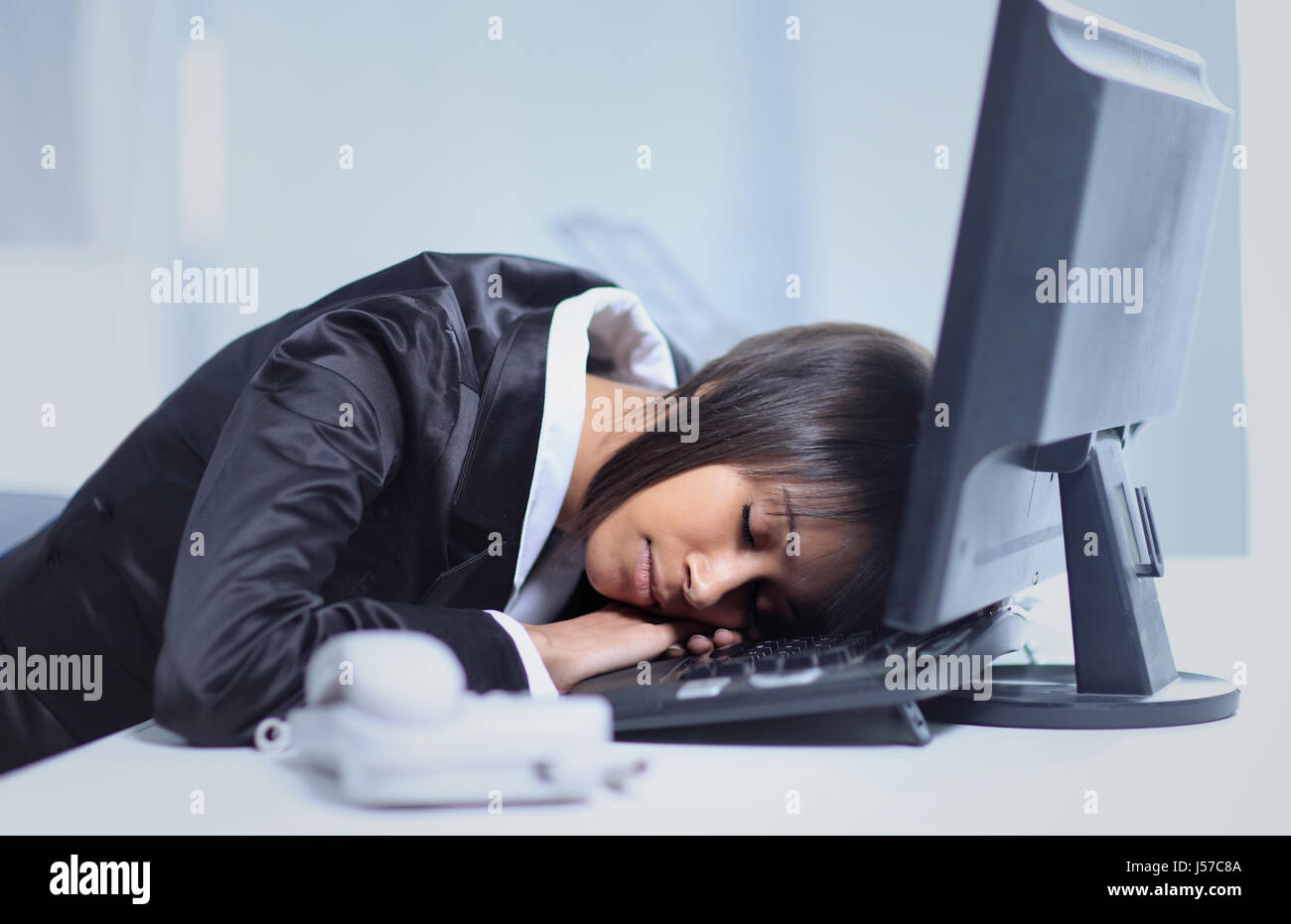 businesswoman sleeping in her office Stock Photo - Alamy