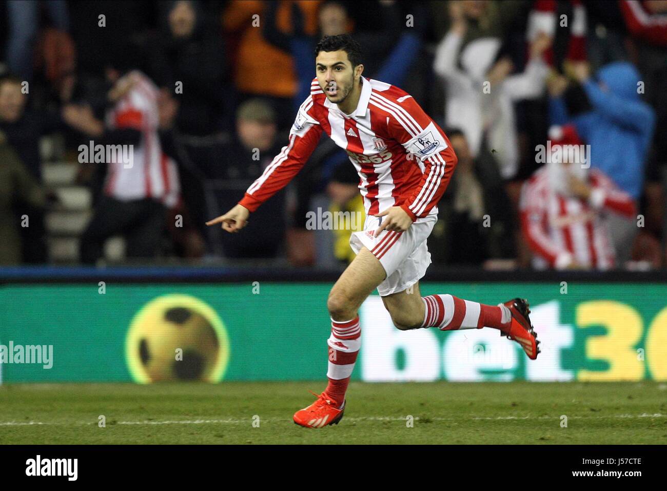 OUSSAMA ASSAIDI CELEBRATES STOKE CITY V CHELSEA THE BRITANNIA STADIUM ...