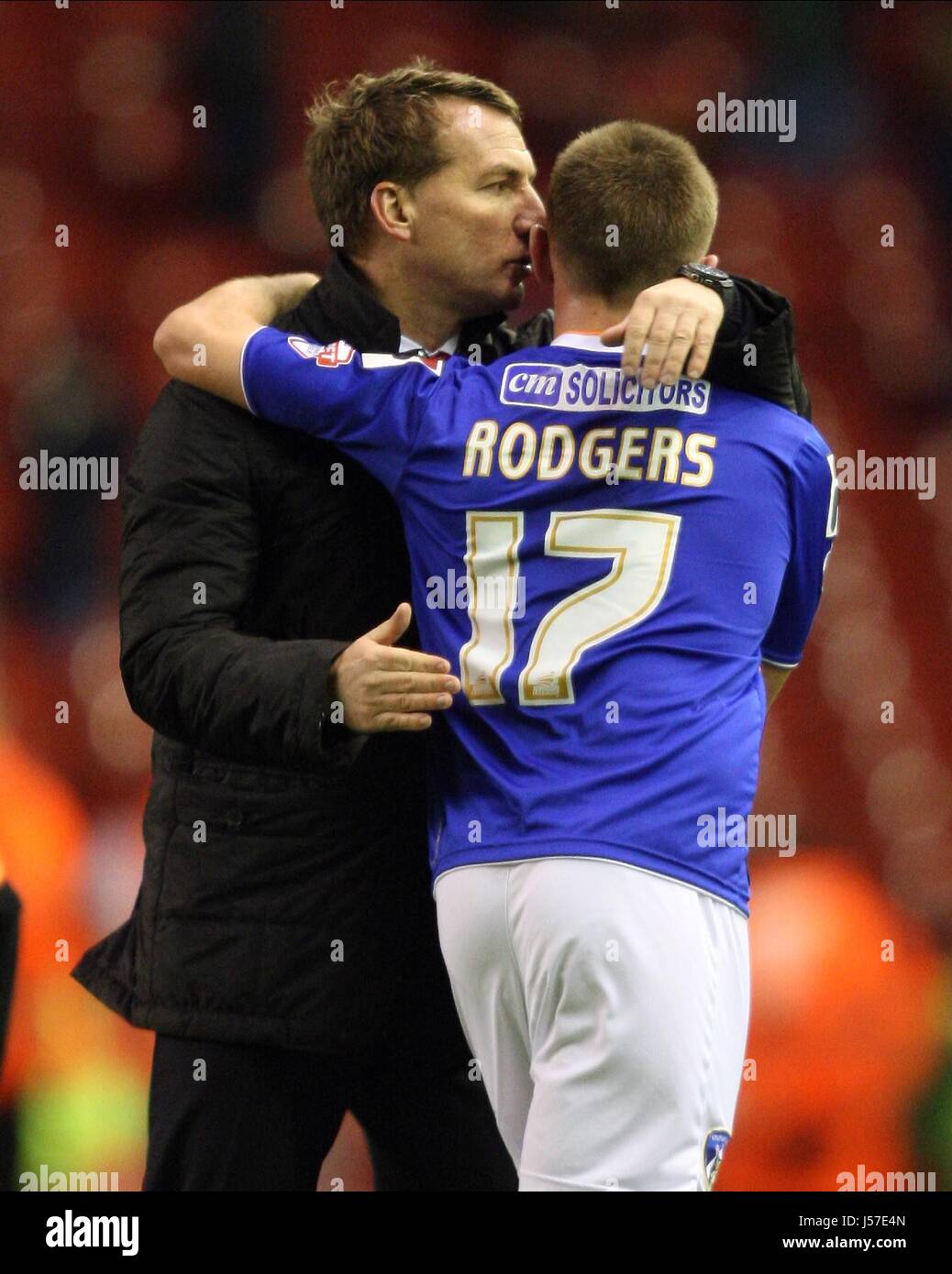 BRENDAN RODGERS HUGS HIS SON A LIVERPOOL V OLDHAM ATHLETIC ANFIELD ...