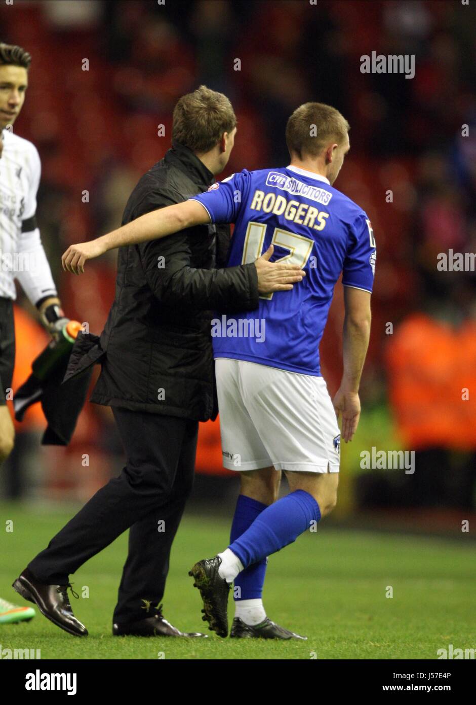 BRENDAN RODGERS HUGS HIS SON A LIVERPOOL V OLDHAM ATHLETIC ANFIELD ...