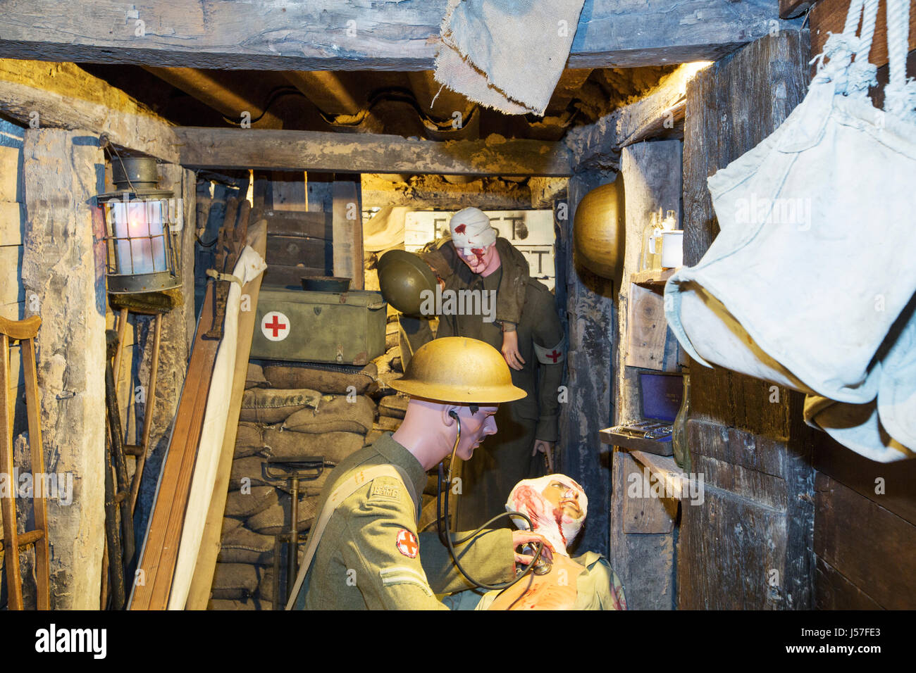 British soldiers being treated by a medic in an underground bunker at ...