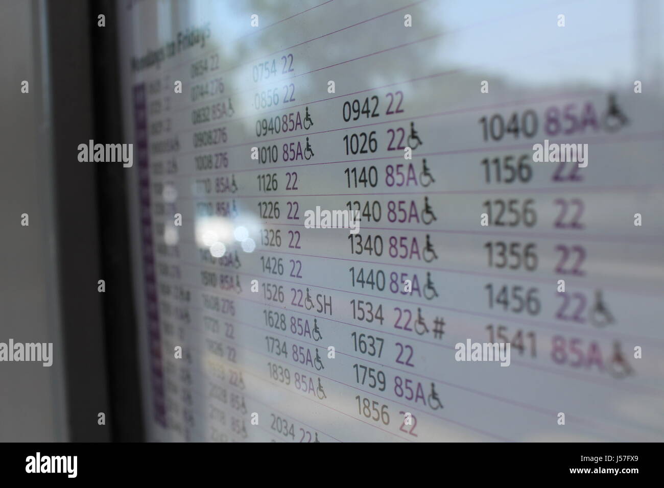 Bus schedule display Stock Photo - Alamy