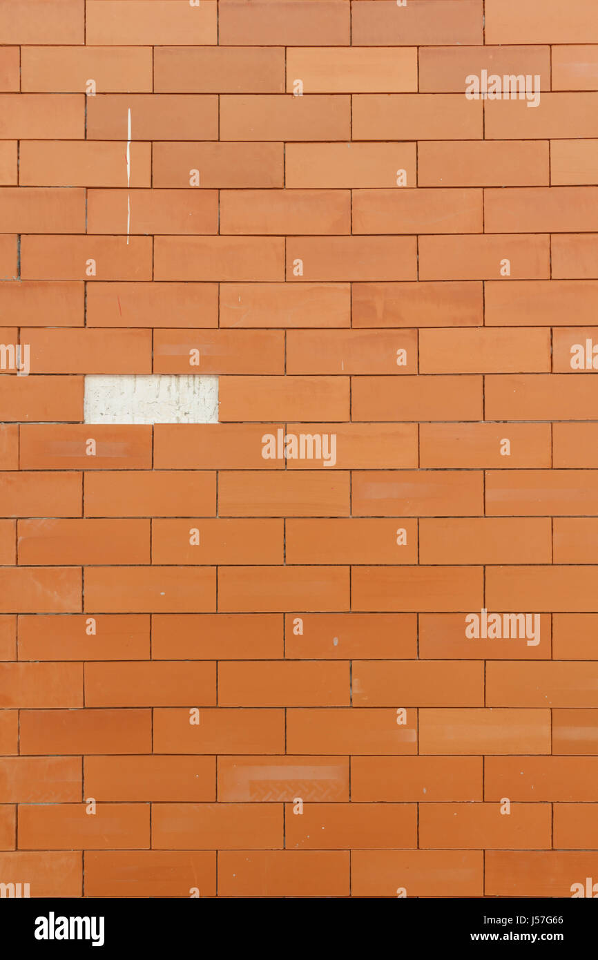 One of brick lost. It shows a mistake from installation Stock Photo - Alamy