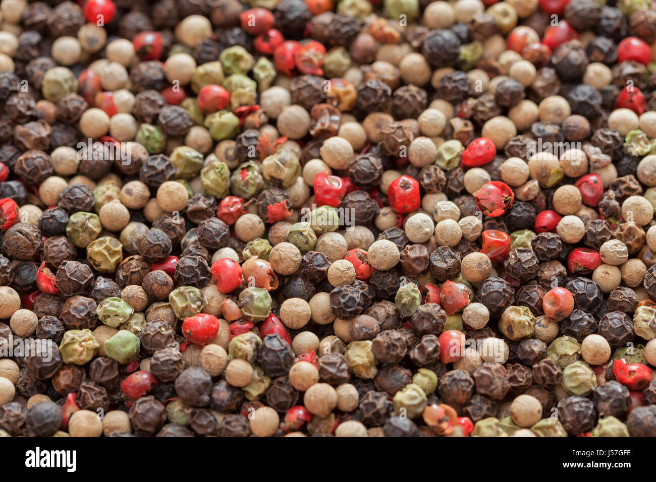 Mixed peppercorn background. Closeup Stock Photo - Alamy