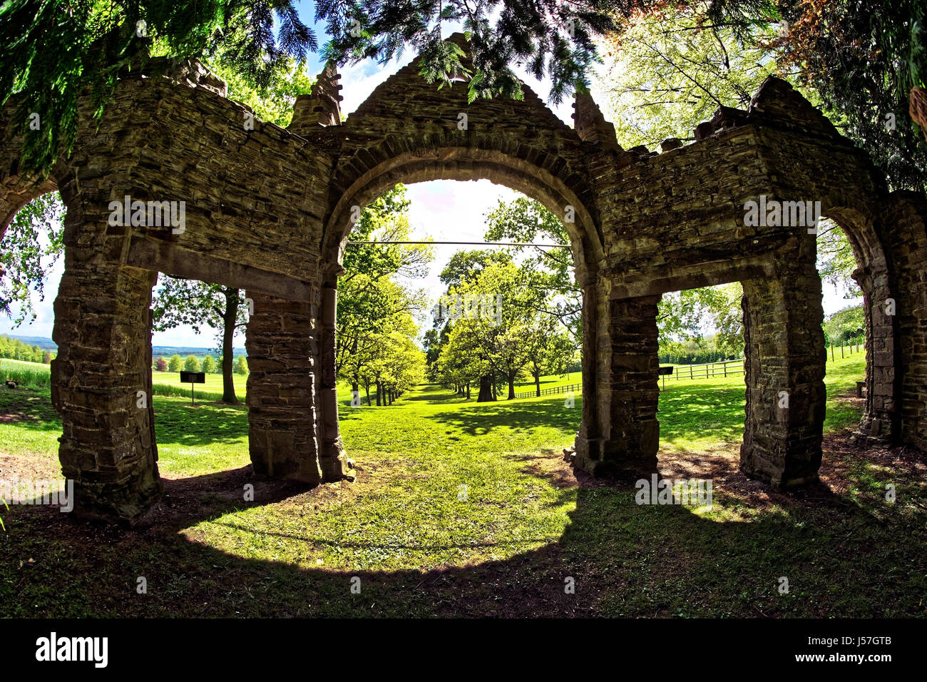 Arches from the original church at Shobdon, Herefordshire form a folly ...