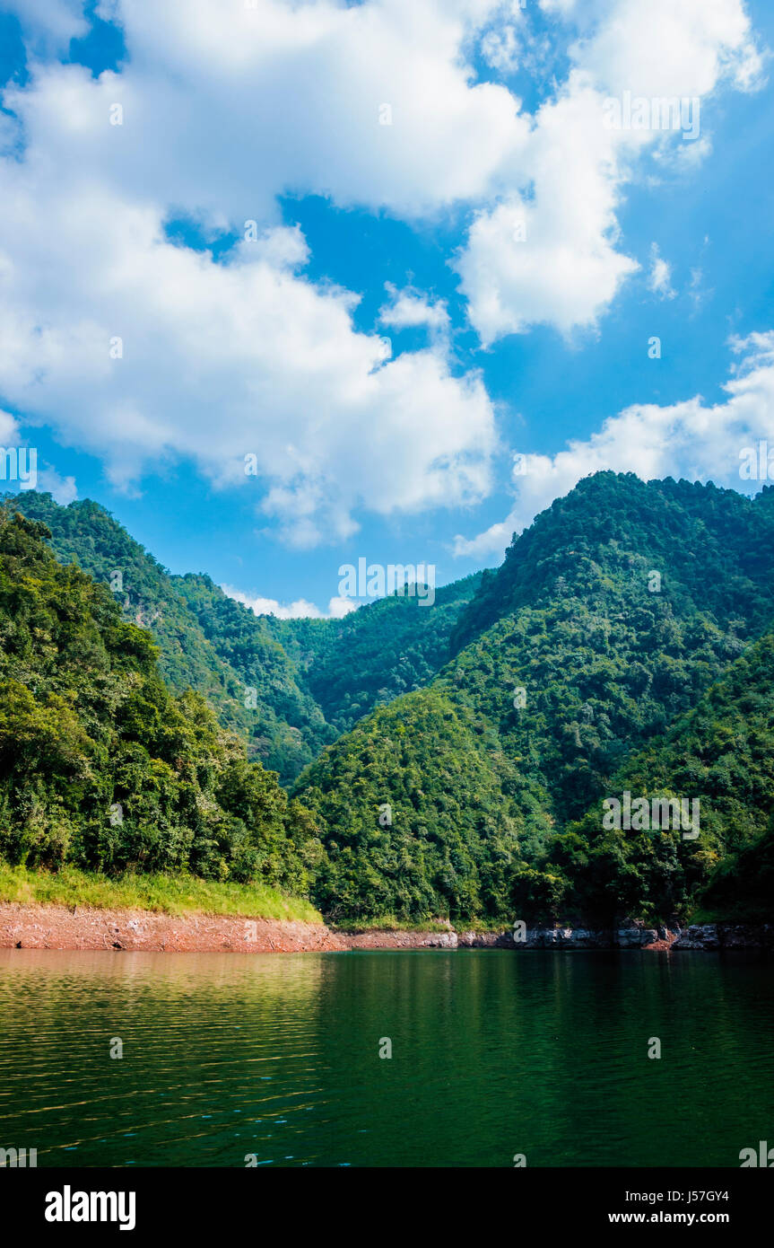 Beautiful reservoir scenery with blue sky in summer Stock Photo - Alamy