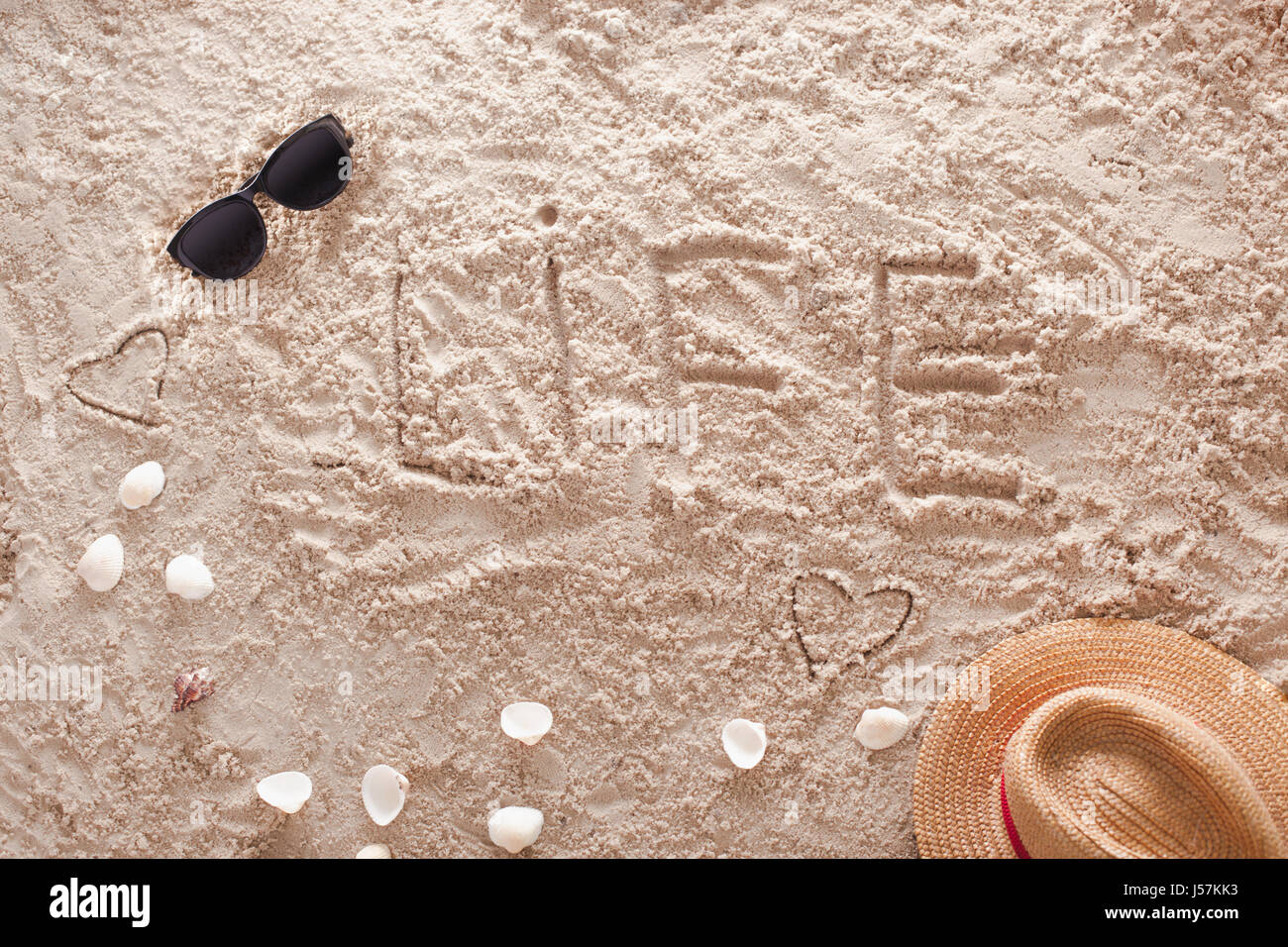 Life at sandy tropical beach Stock Photo - Alamy