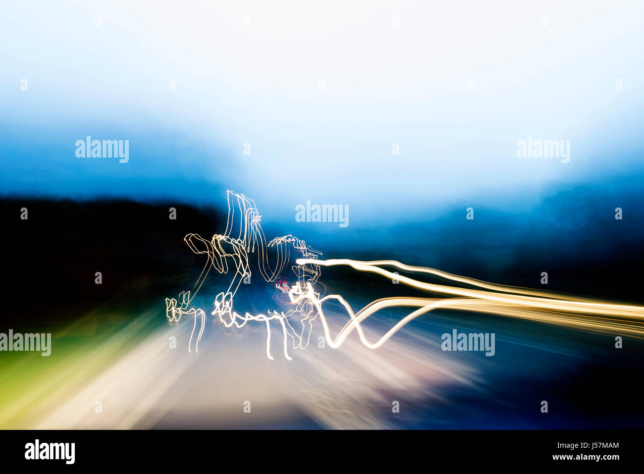 Car headlights dusk hi-res stock photography and images - Alamy