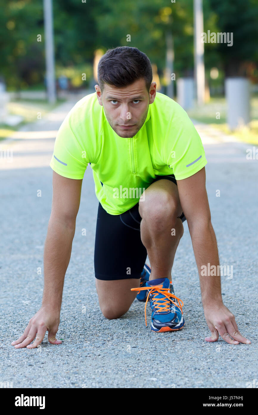 Healthy sport man running in the park Stock Photo - Alamy