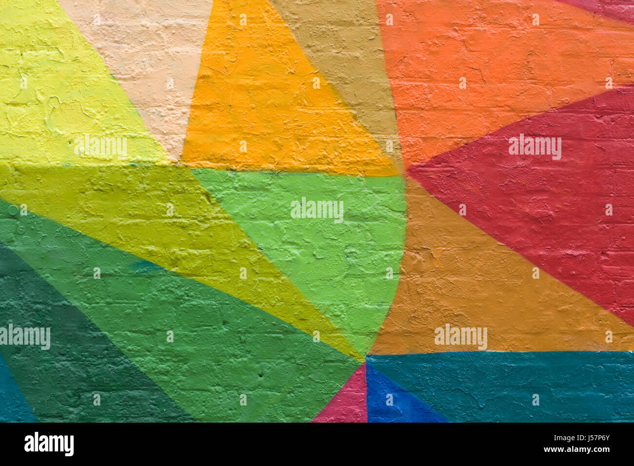 Abstract coloured pattern on brickwork Stock Photo - Alamy