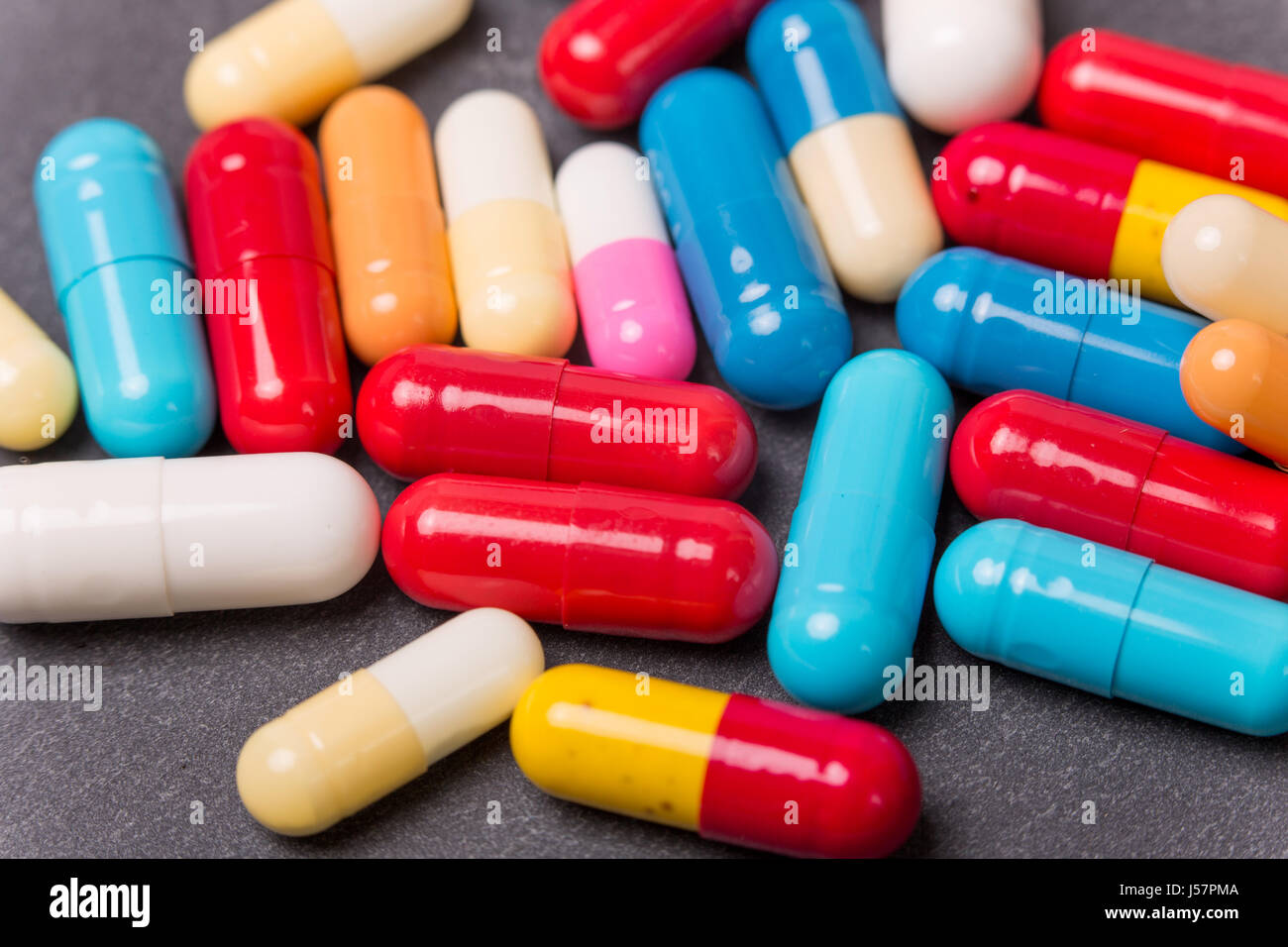 different Tablets pills capsule heap mix therapy drugs Stock Photo - Alamy