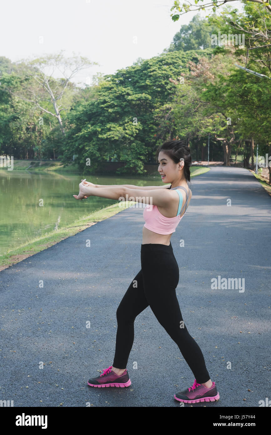 Female sport fitness athlete runner getting ready for jogging outdoors ...