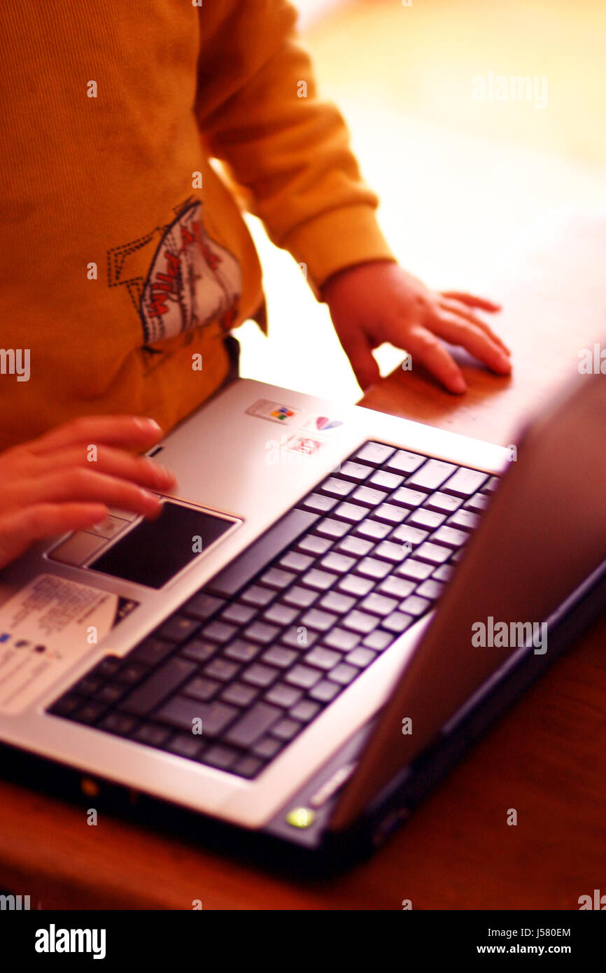 child on laptop Stock Photo - Alamy