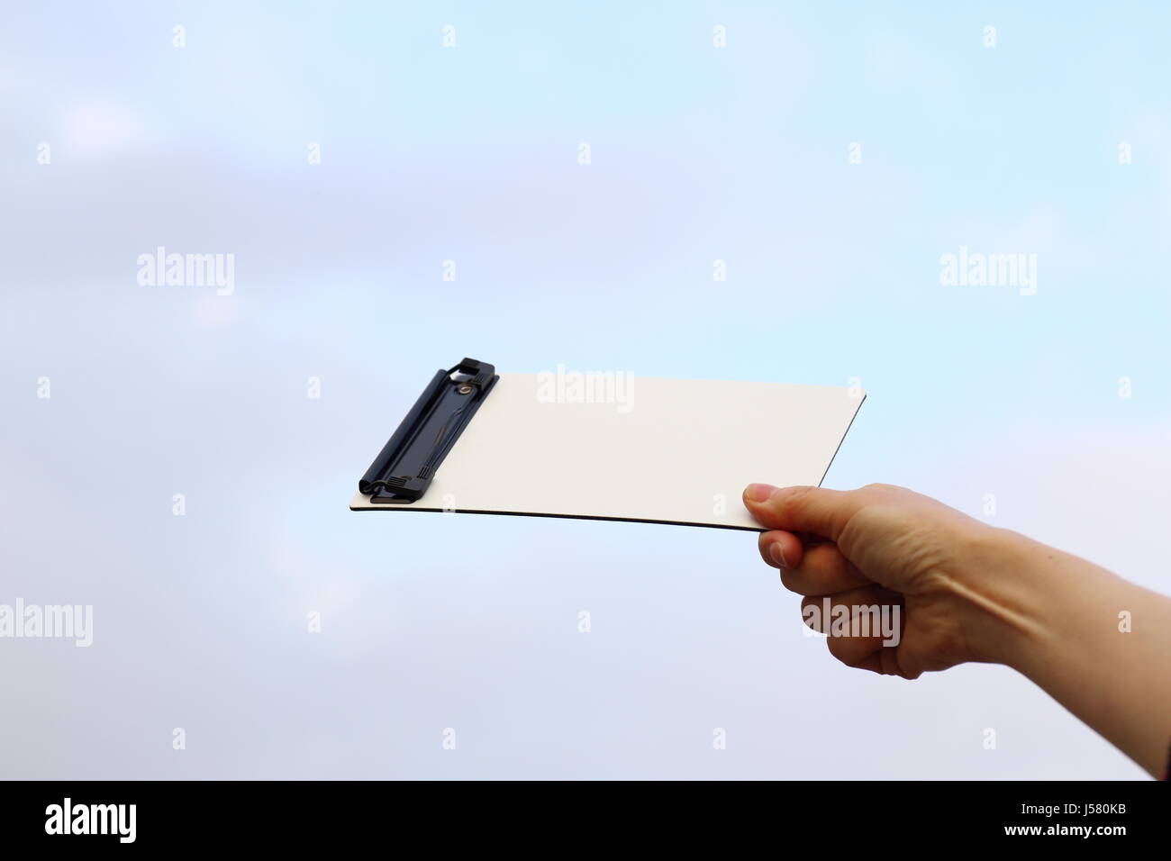 Woman Hand Holding Board Stock Photo - Alamy
