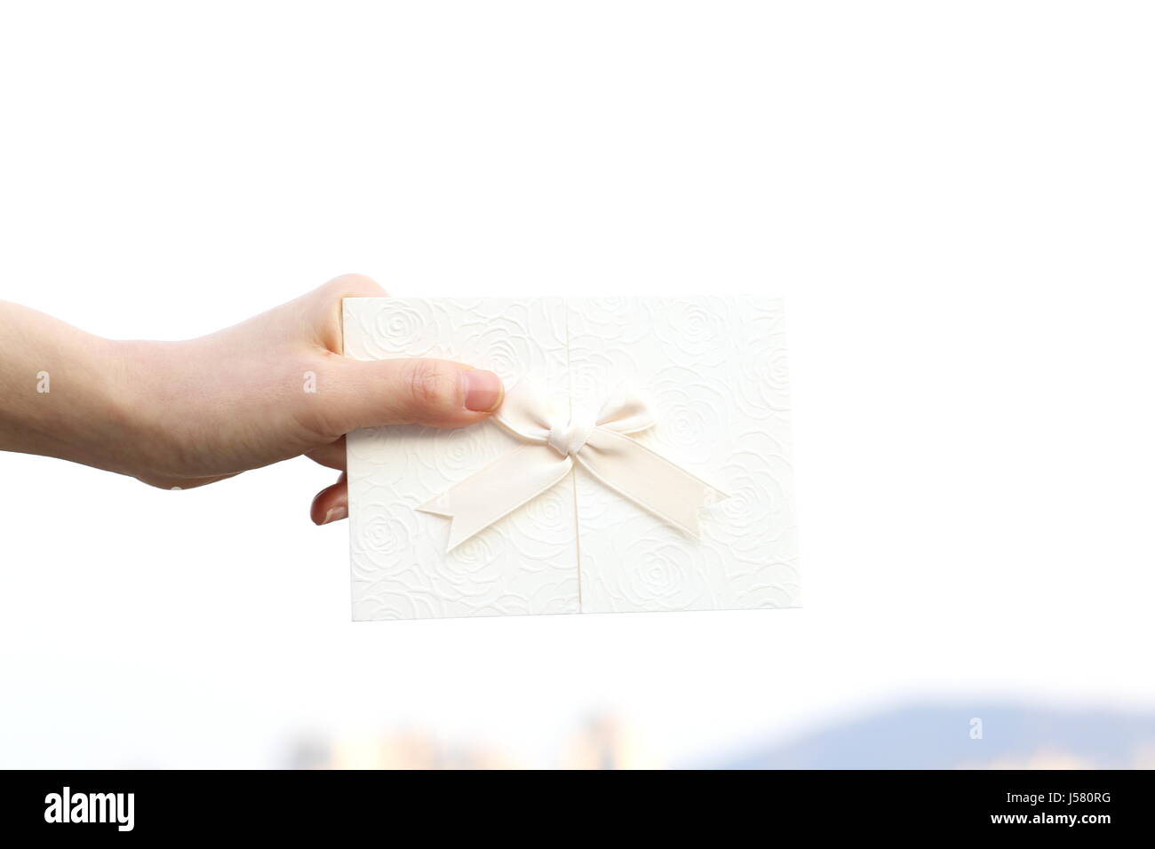 Woman Hand Holding Invitation Card Stock Photo - Alamy