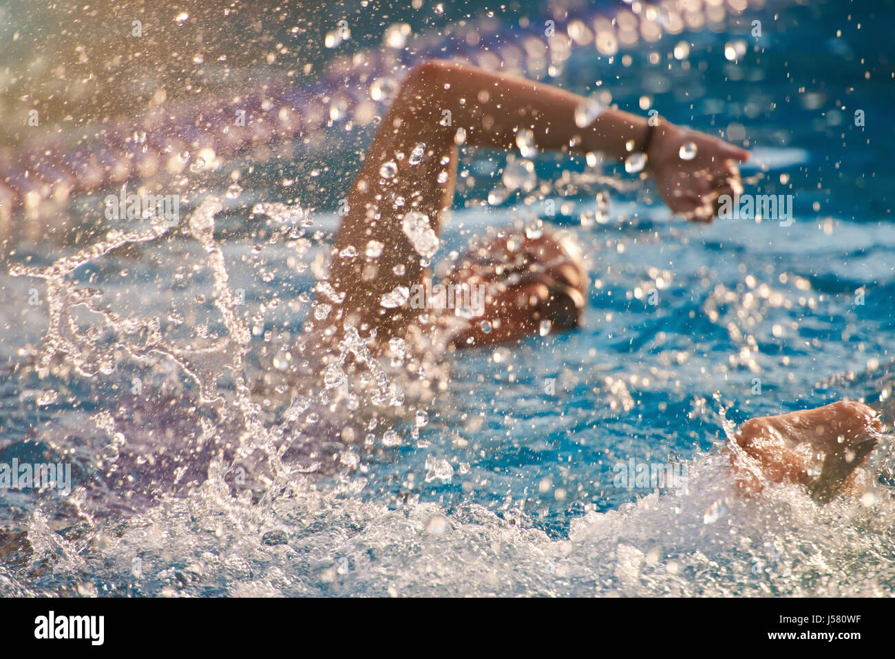 Man diving into pool hi-res stock photography and images - Alamy