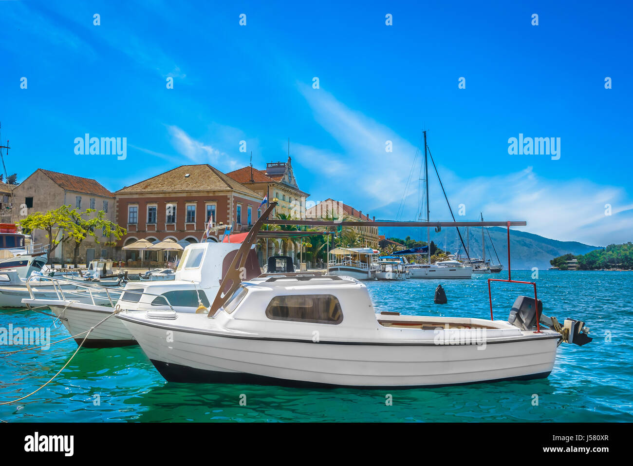 Waterfront view at city center of town Stari Grad, the oldest town in ... Waterfront view at city center of town Stari Grad, the oldest town in ...