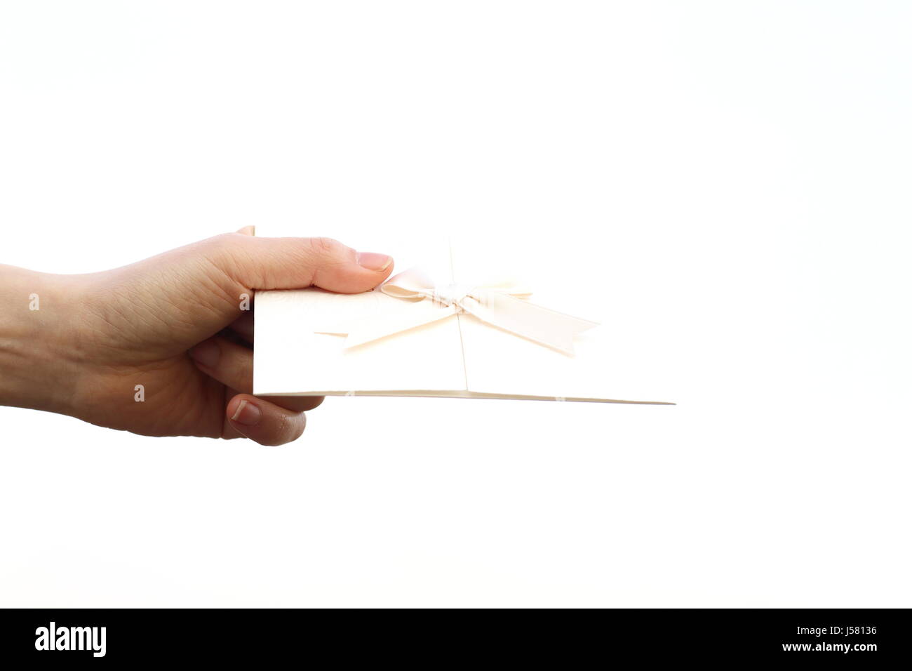 Woman Hand Holding Invitation Card Stock Photo - Alamy