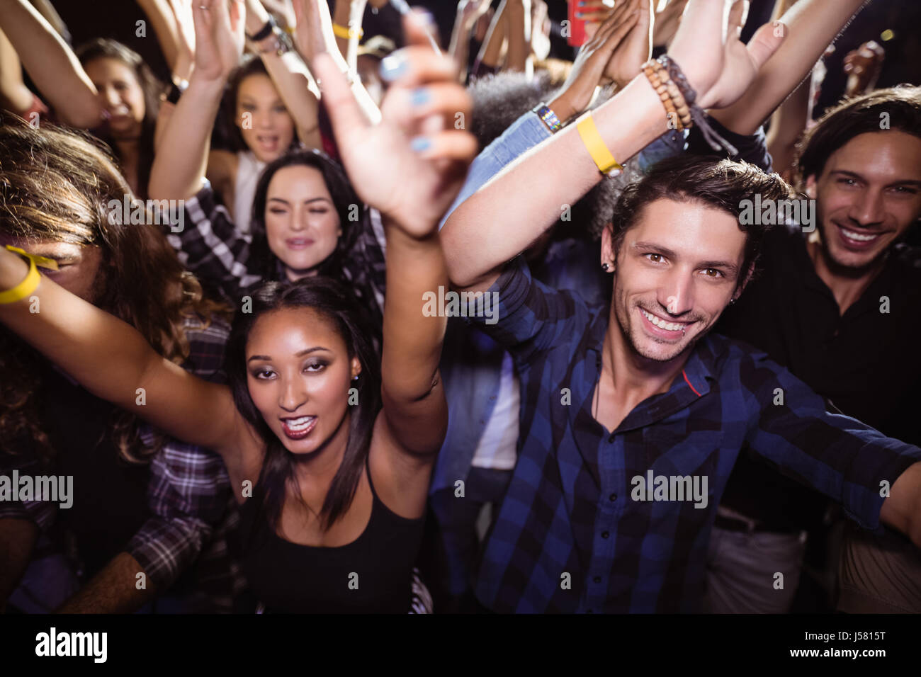Full frame shot of crowd at nightclub during music festival Stock Photo ...