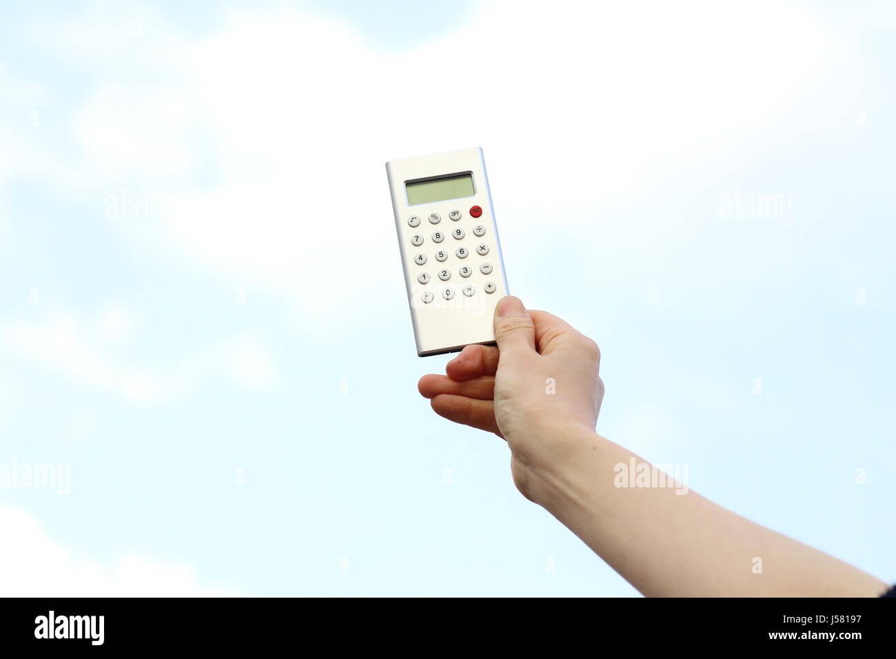 Woman Hand Holding Calculator Stock Photo - Alamy