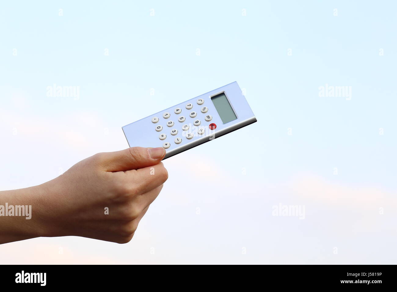 Woman Hand Holding Calculator Stock Photo - Alamy