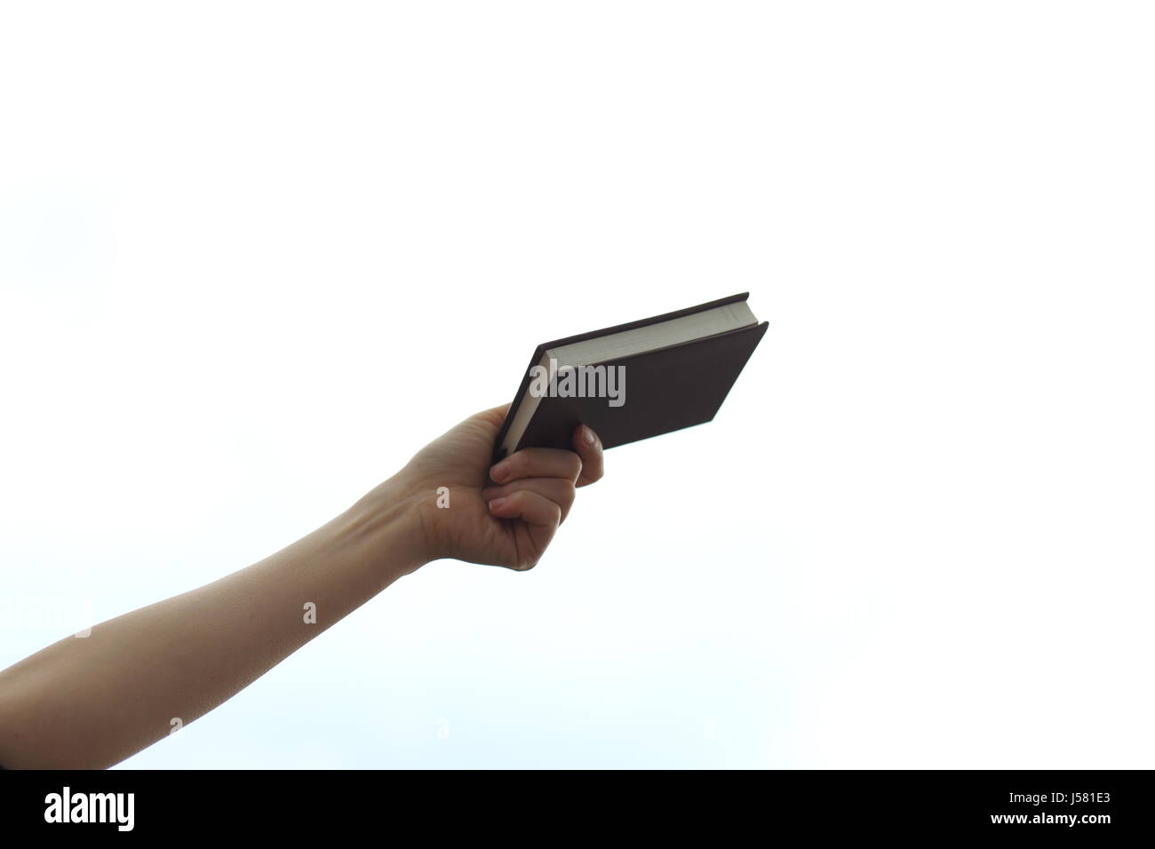 Woman Hand Holding Notebook Stock Photo - Alamy