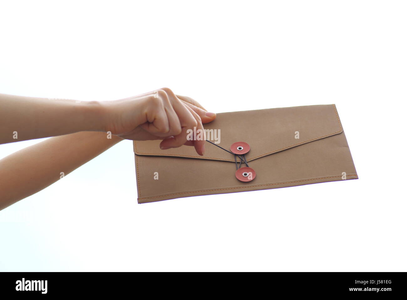 Woman Hand Holding Envelope Stock Photo - Alamy