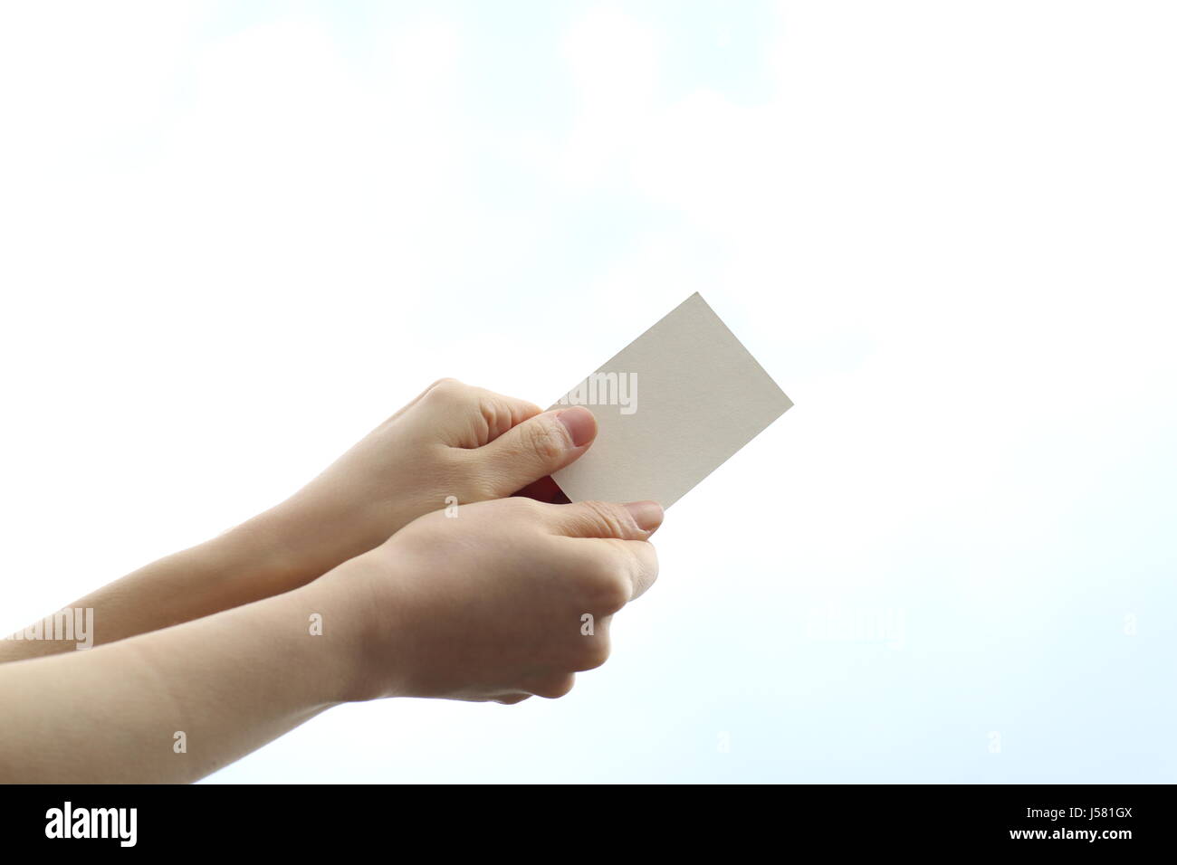 Woman Hand Holding Card Stock Photo - Alamy