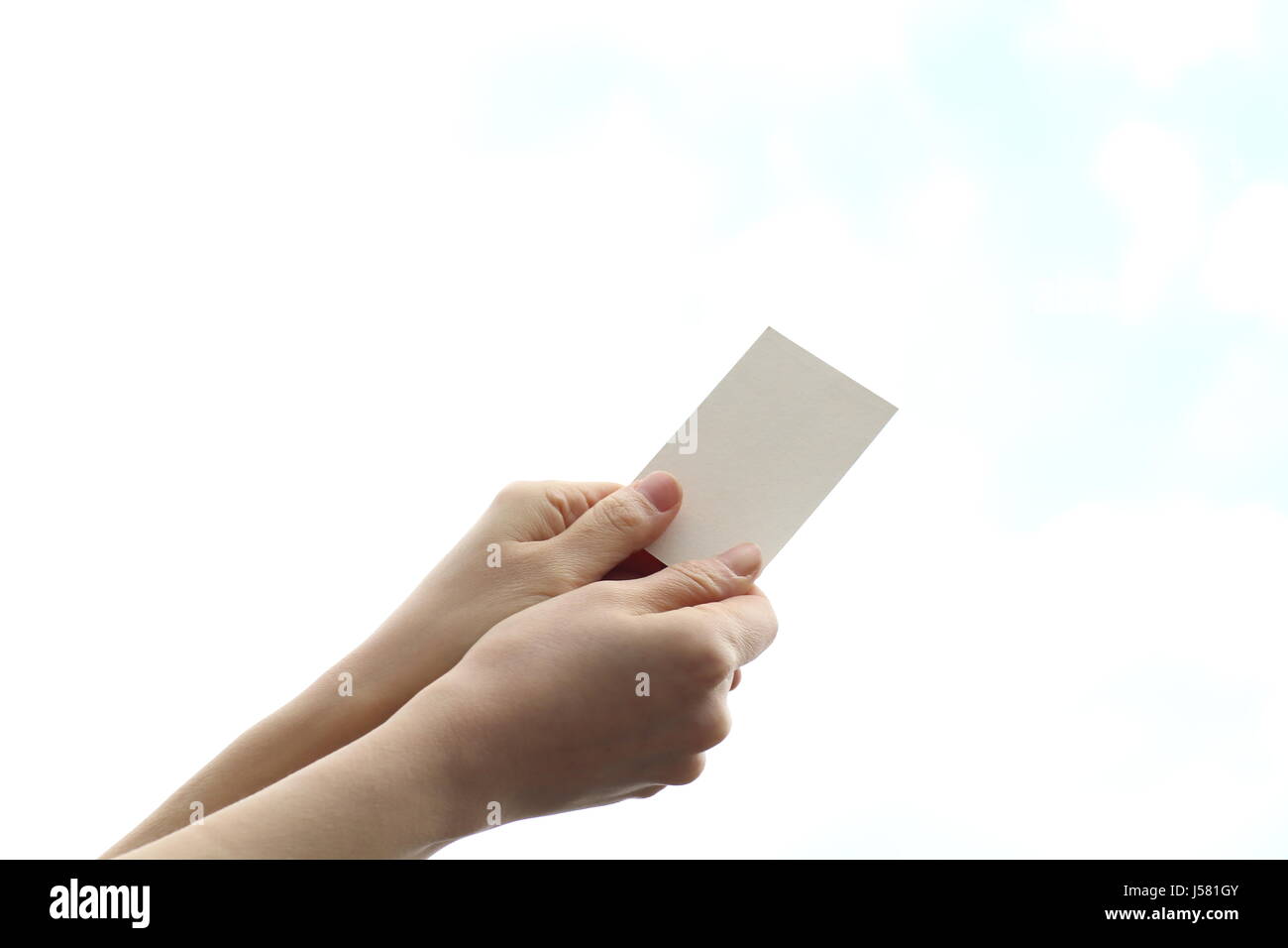 Woman Hand Holding Card Stock Photo - Alamy